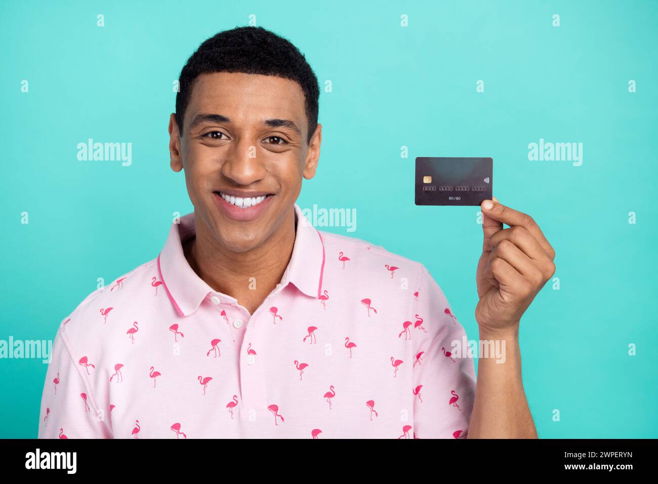 Photo of nice cheerful person toothy smile hand hold showing plastic ...