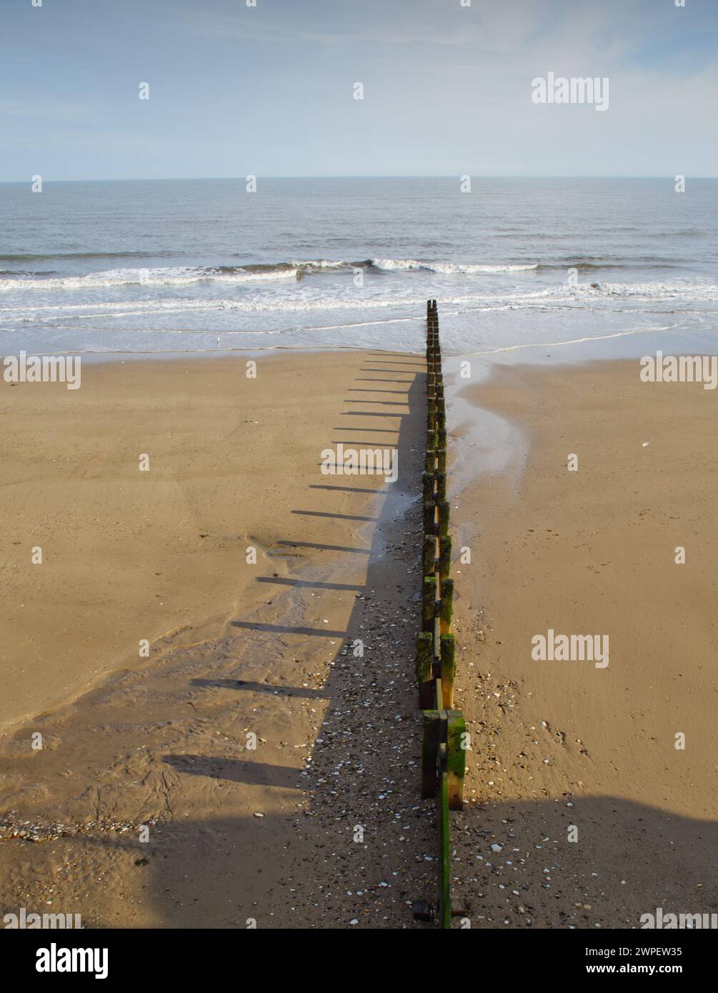 Groynes on the beach at Bridlington in Yorkshire protecting the ...