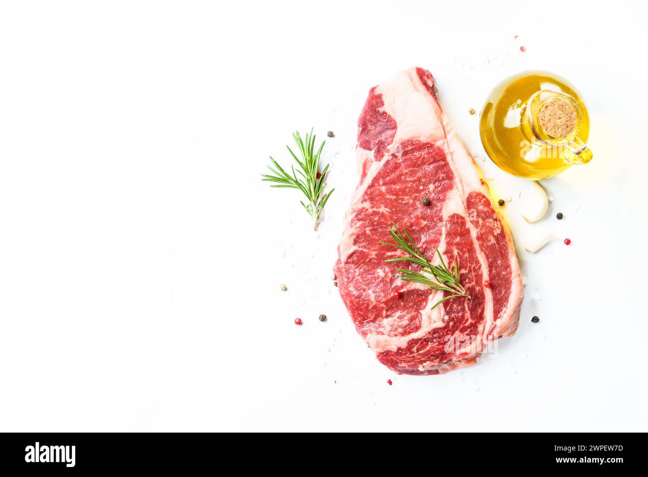 Beef steak ribeye with spices and herbs on black background Stock Photo ...