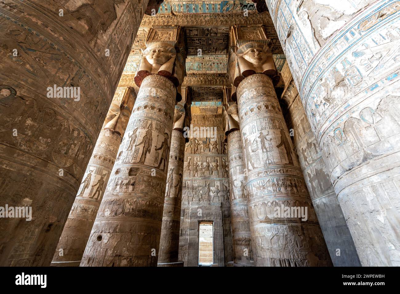 Beautiful ornate columns in the Temple of Hathor in Dendera, Egypt ...