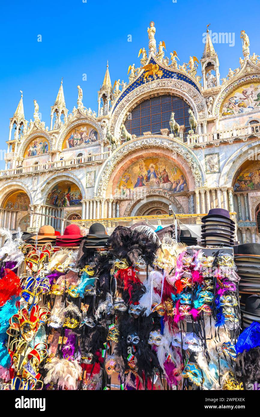 Basilica of Saint Mark and carnival stand in Venice view, tourist ...