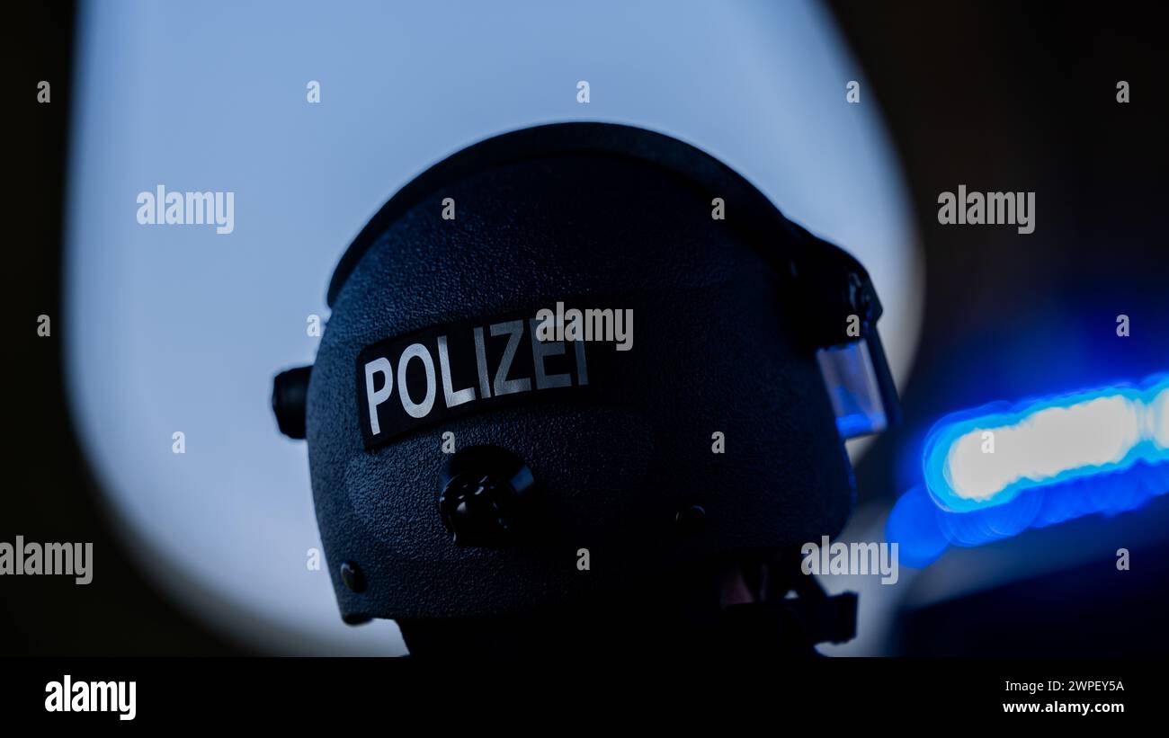 Duesseldorf, Germany. 07th Mar, 2024. A police officer wears a ...