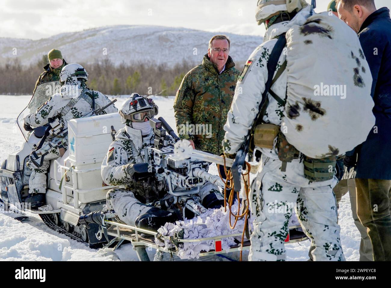 German Defense Minister Boris Pistorius, background center, meets with ...
