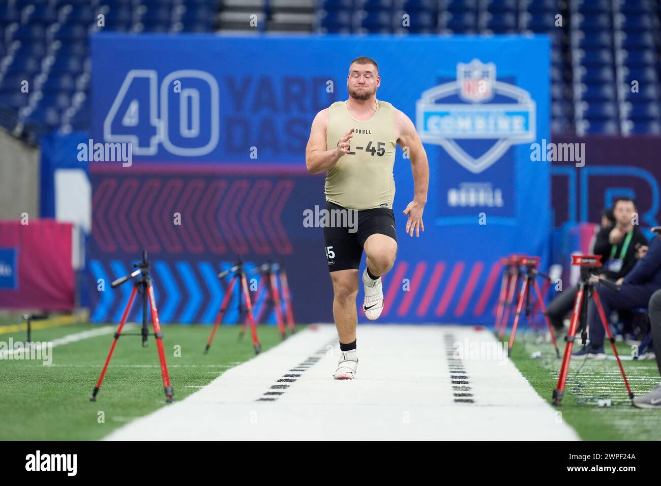 Arkansas offensive lineman Beaux Limmer runs a drill at the NFL football scouting combine ...