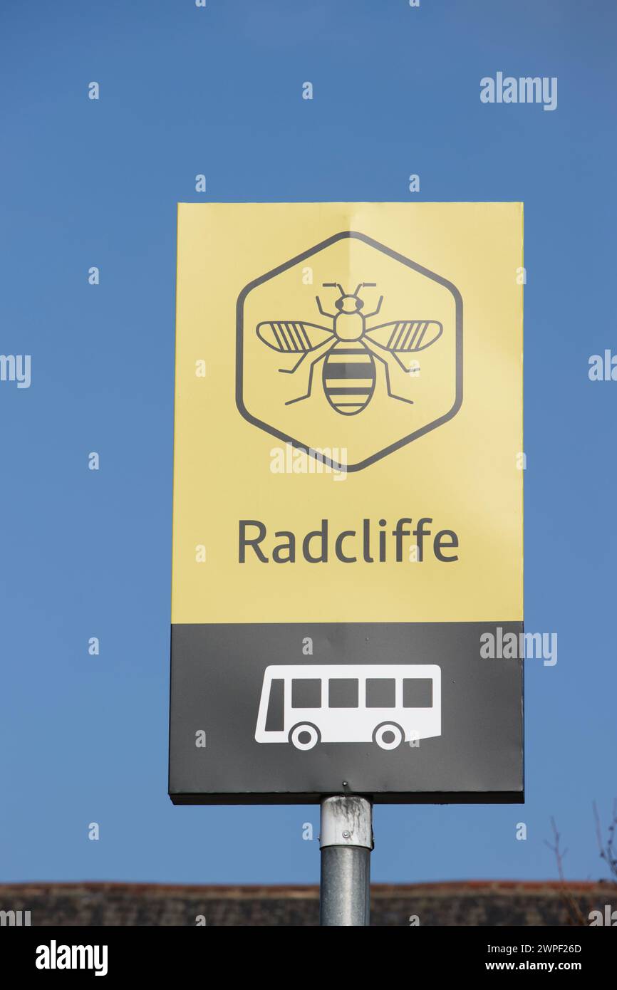 Bee network bus sign with blue sky and sunshine in Radcliffe near bury ...