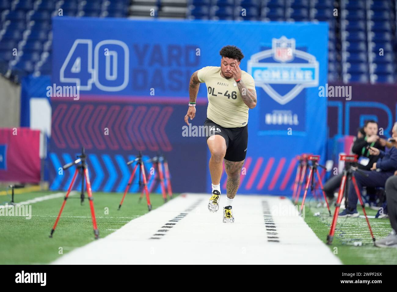 Boston College offensive lineman Christian Mahogany runs a drill at the ...