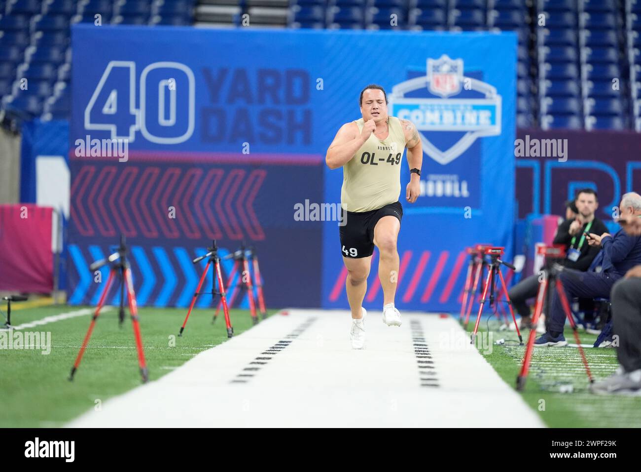 North Carolina State offensive lineman Dylan McMahon runs a drill at ...