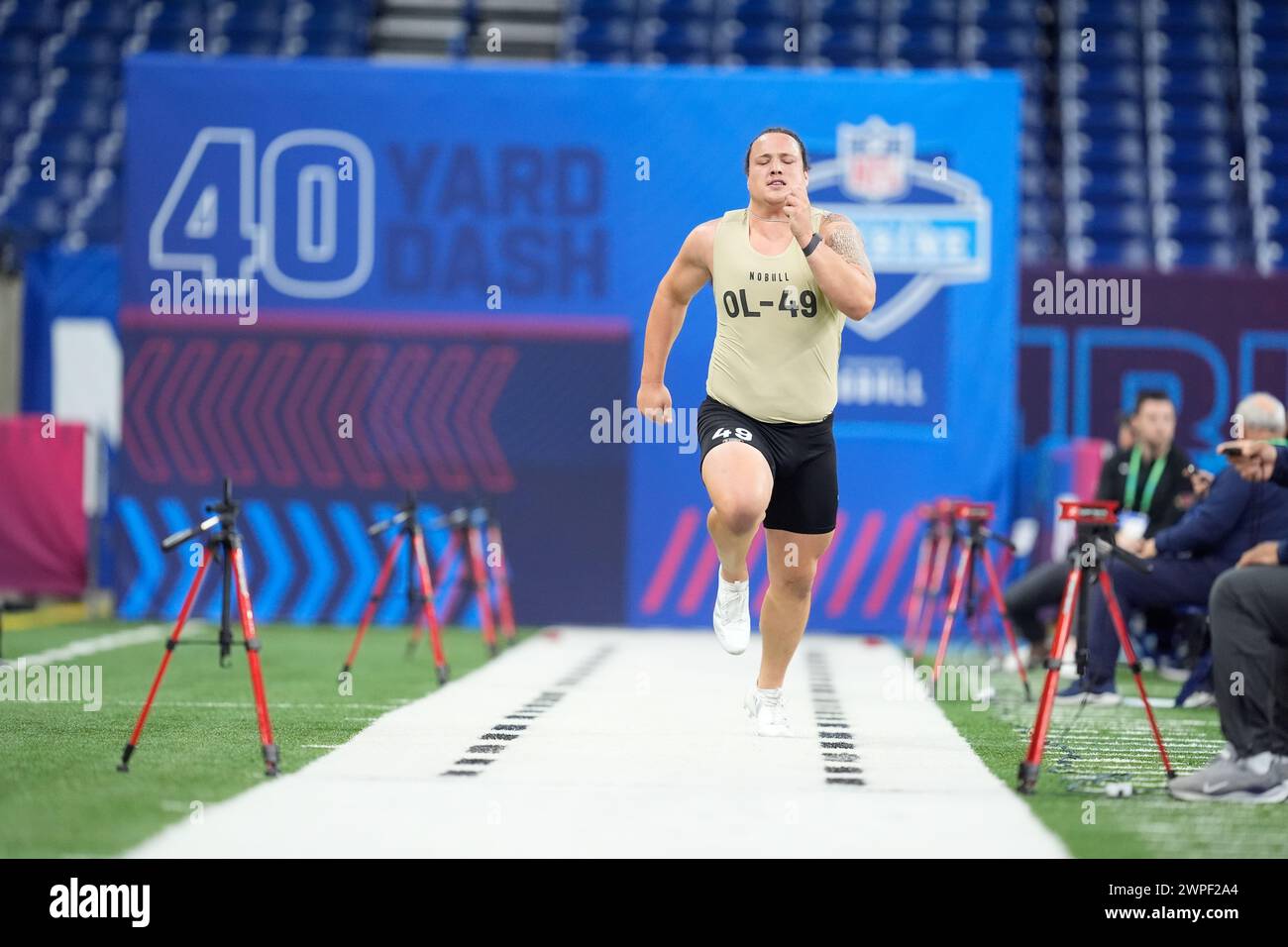 North Carolina State offensive lineman Dylan McMahon runs a drill at ...