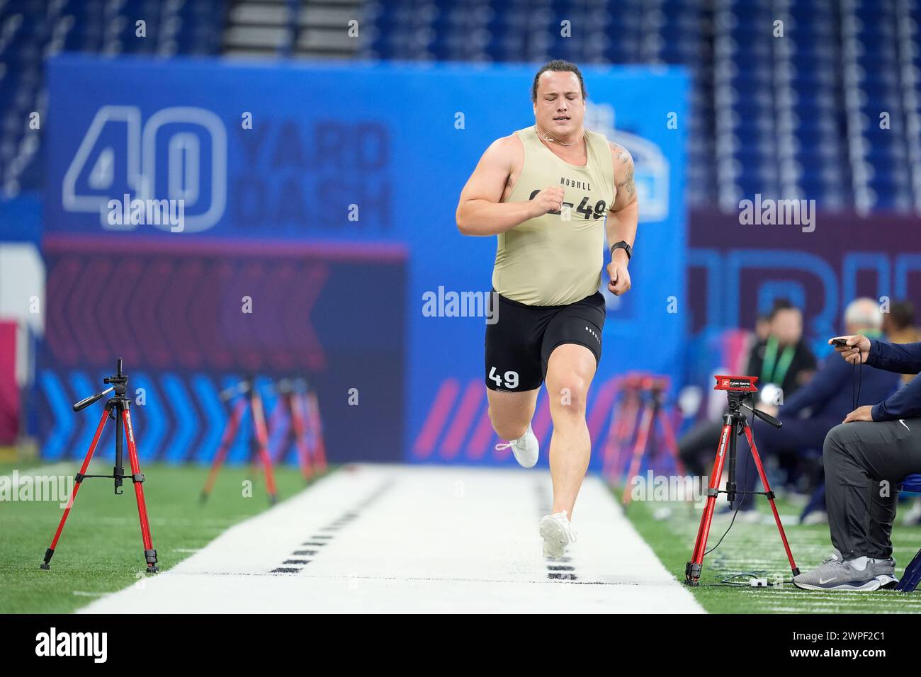North Carolina State offensive lineman Dylan McMahon runs a drill at ...