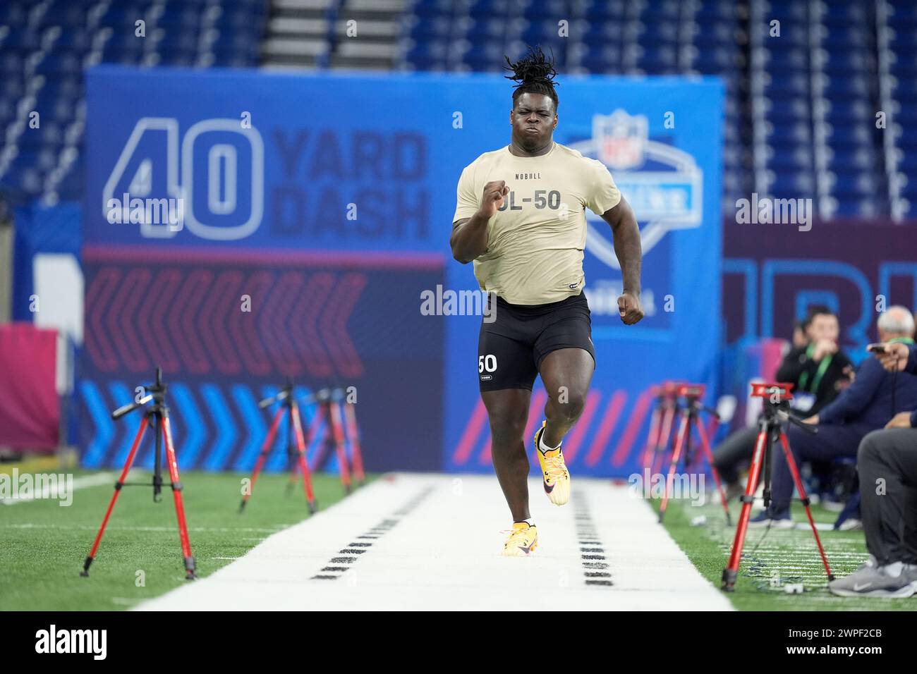 Georgia offensive lineman Amarius Mims runs a drill at the NFL football ...