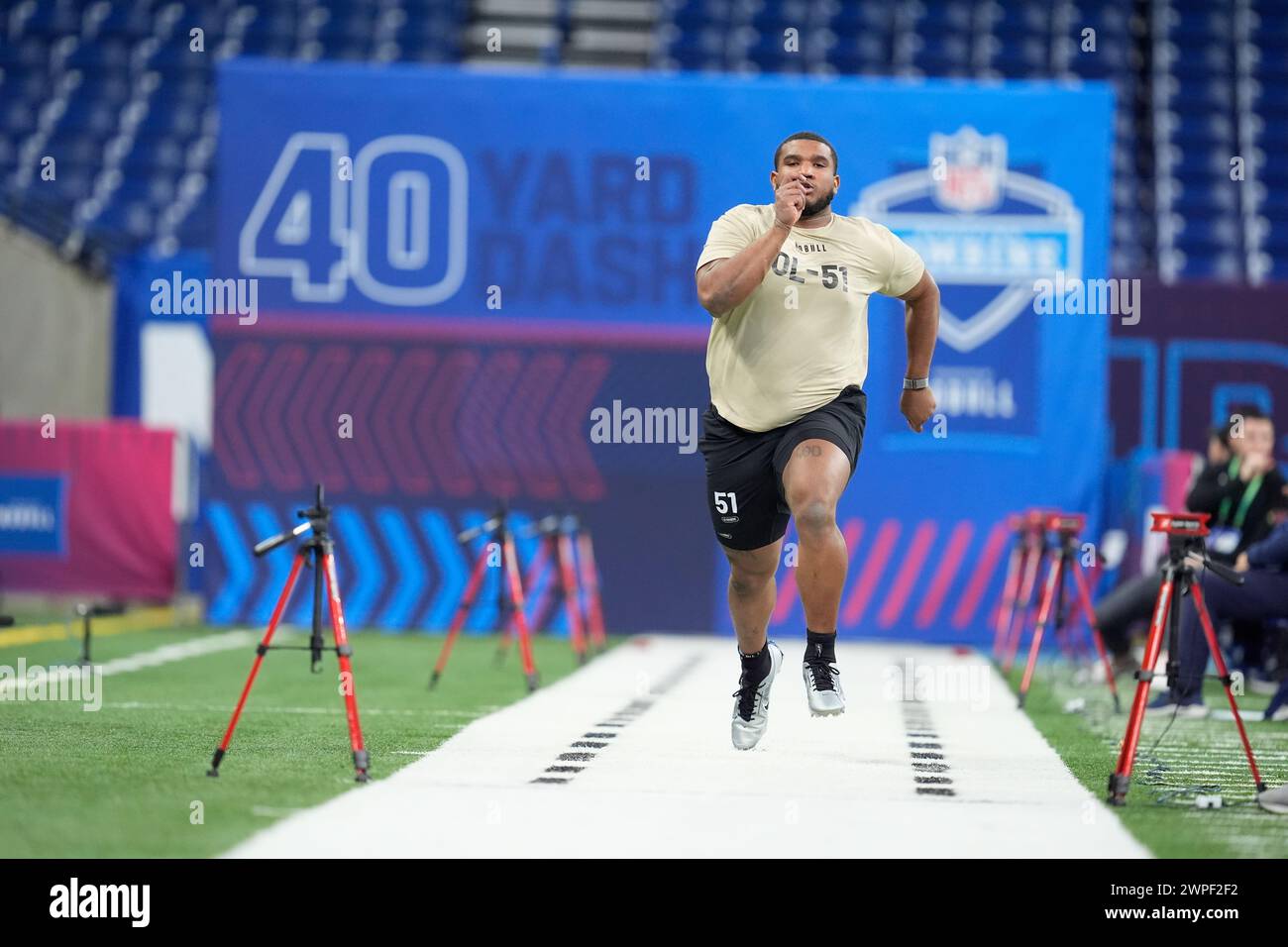 Duke offensive lineman Jacob Monk runs a drill at the NFL football ...