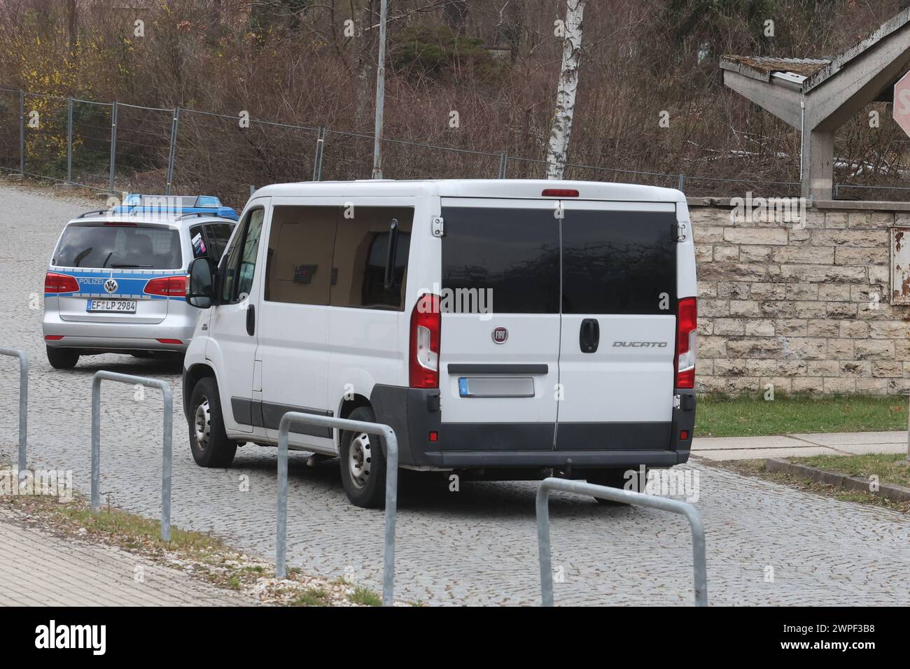 Gera, Germany. 07th Mar, 2024. A minibus carrying refugees drives onto ...