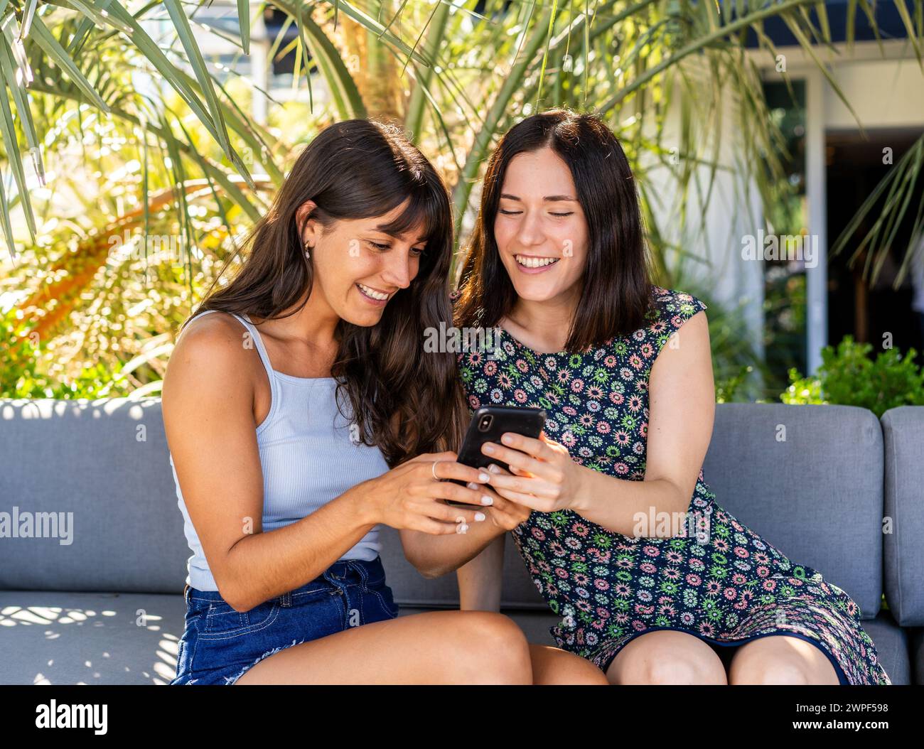 Two female friends meeting hi-res stock photography and images - Alamy