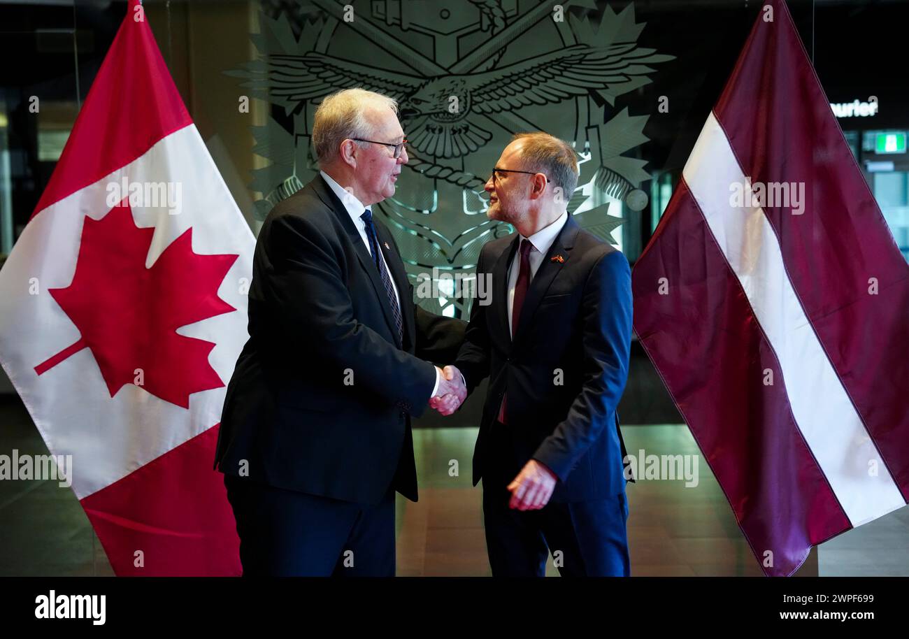 Latvia Minister of Defense, Andris Spruds, takes part in a welcoming ...