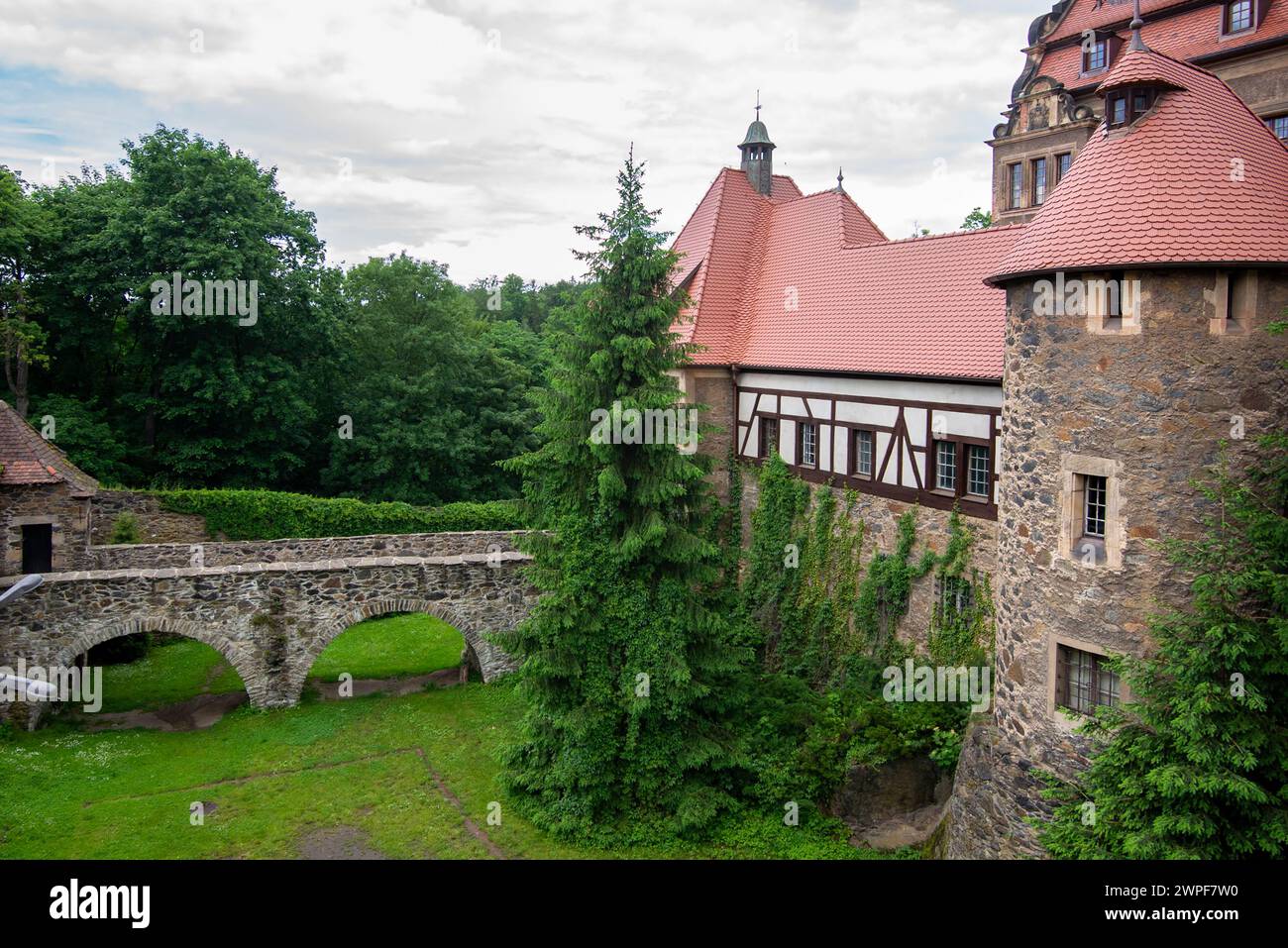 The road leading over the stone bridge over the moat to Czocha Castle ...