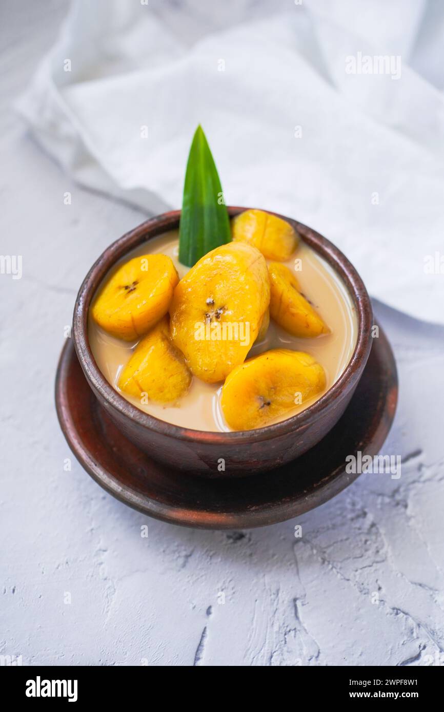 Kolak Pisang: Indonesian dessert made from banana and cooked in coconut ...