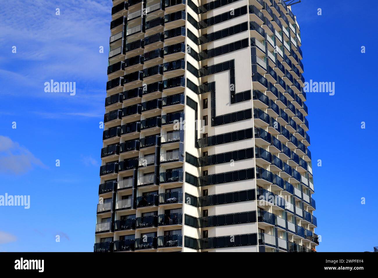 High-rise blue building, skyscraper with balconies, hotel tower, office ...