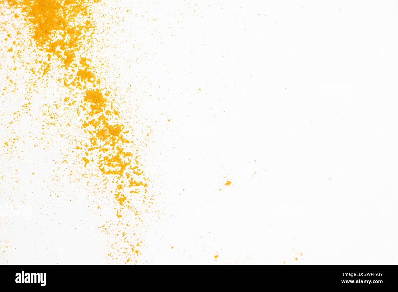 Scattered turmeric powder on white background, turmeric pattern and ...