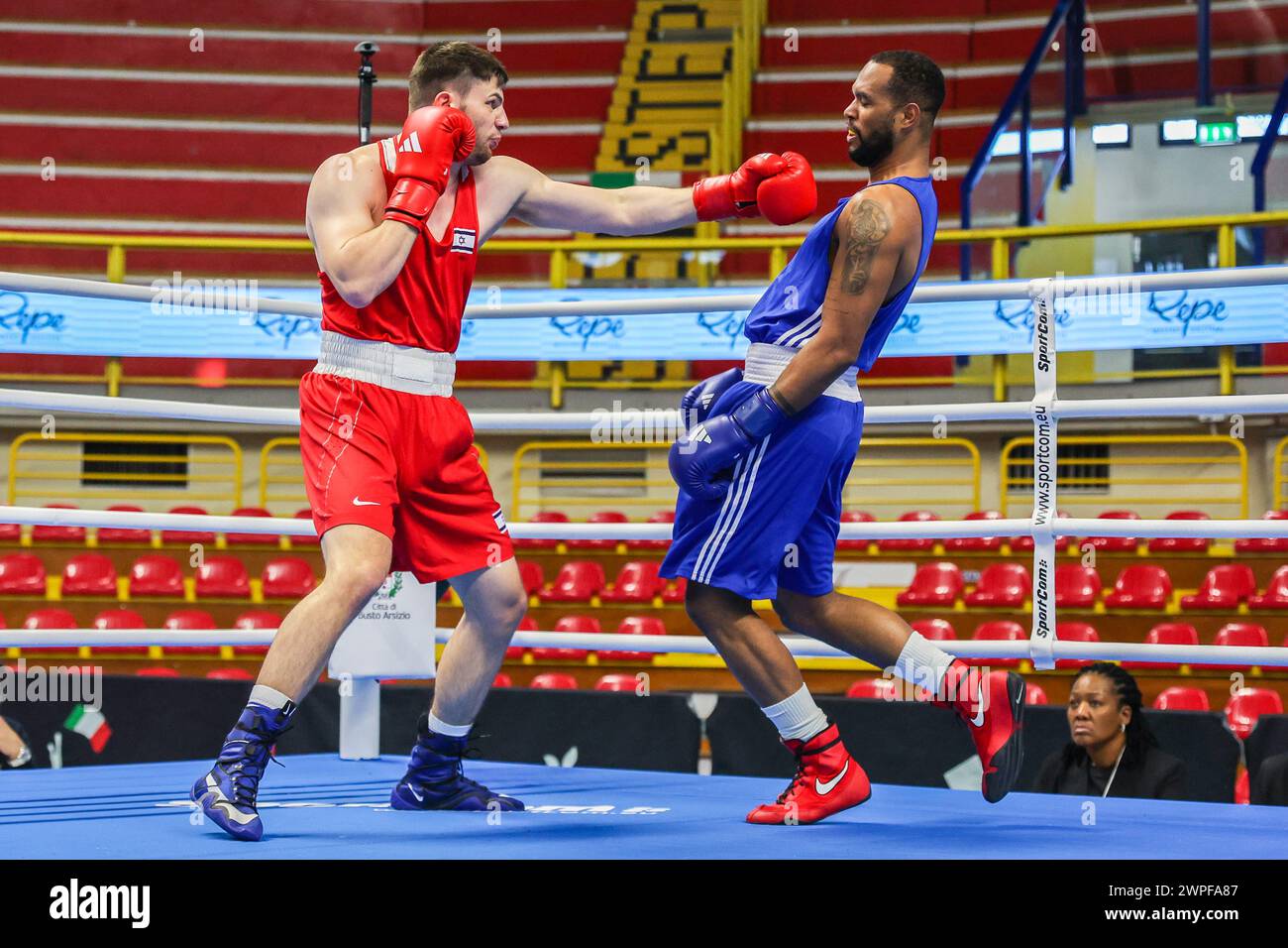 Yan Zak (Red) of Israel in action against Loren Berto Alfonso Dominguez ...