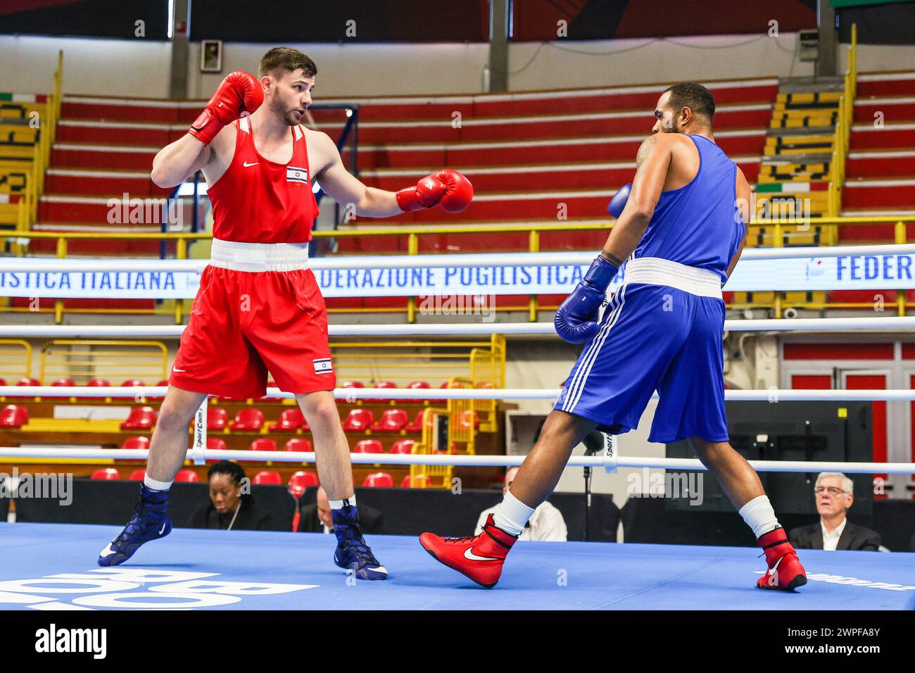 Yan Zak (Red) of Israel in action against Loren Berto Alfonso Dominguez ...