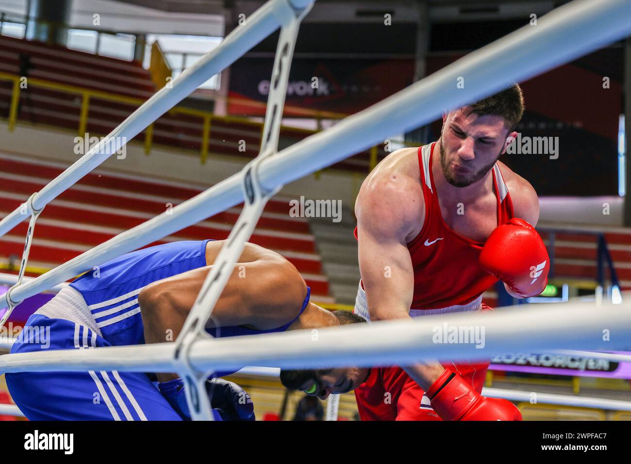 Yan Zak (Red) of Israel in action against Loren Berto Alfonso Dominguez ...