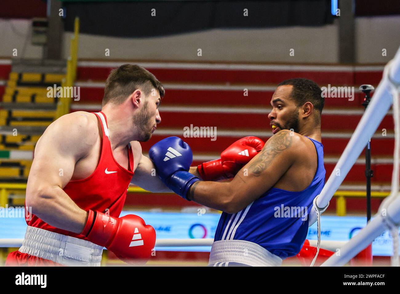 Yan Zak (Red) of Israel in action against Loren Berto Alfonso Dominguez ...