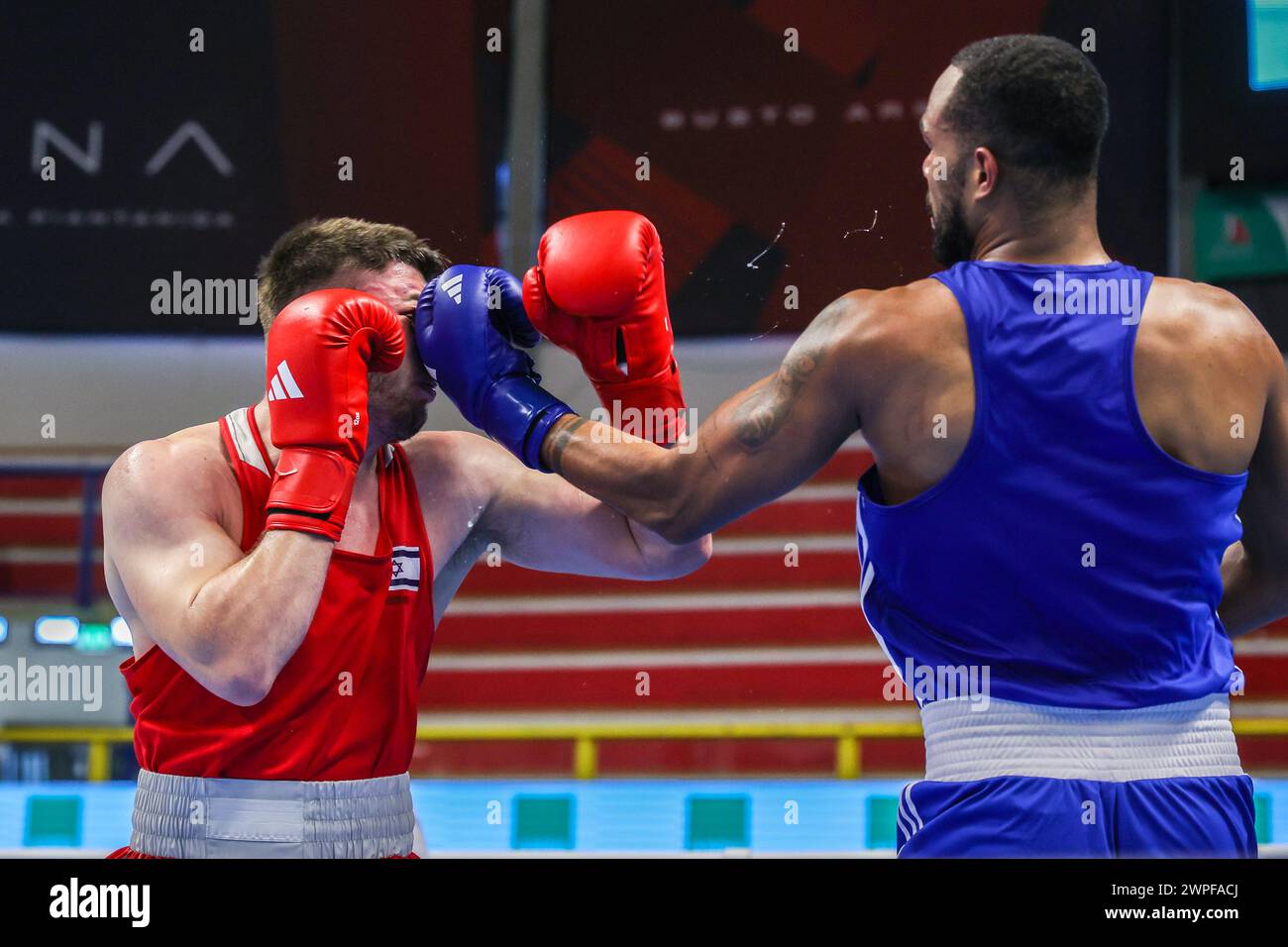 Yan Zak (Red) of Israel in action against Loren Berto Alfonso Dominguez ...
