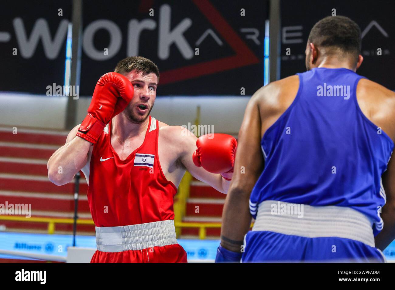 Yan Zak (Red) of Israel in action against Loren Berto Alfonso Dominguez ...