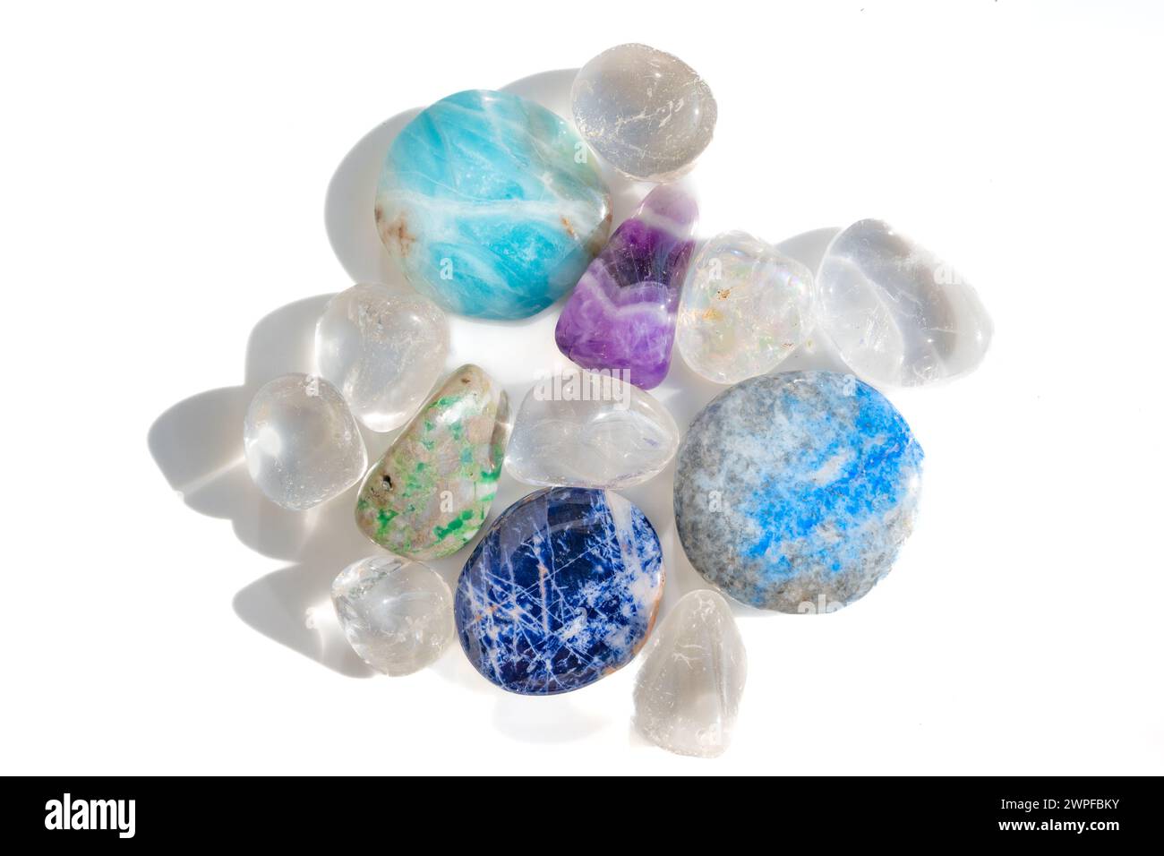 Various stones with white background Stock Photo - Alamy