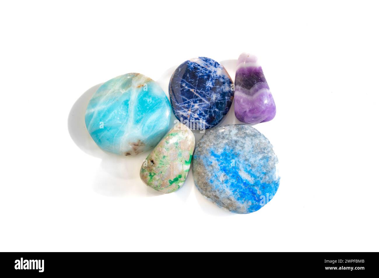 Various stones with white background Stock Photo - Alamy