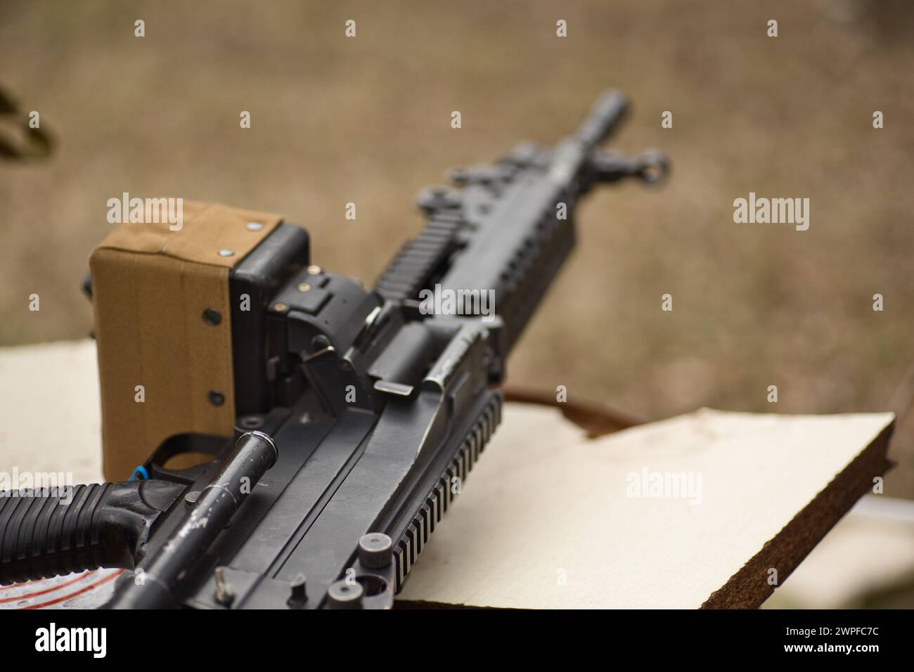 airsoft replica weapon, machine gun on a natural background Stock Photo ...