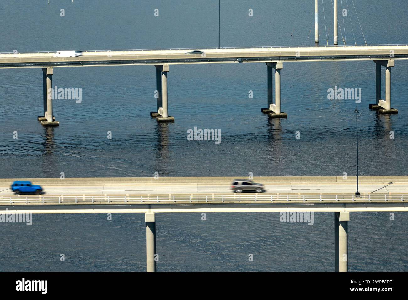 Barron Collier Bridge and Gilchrist Bridge in Florida with moving ...