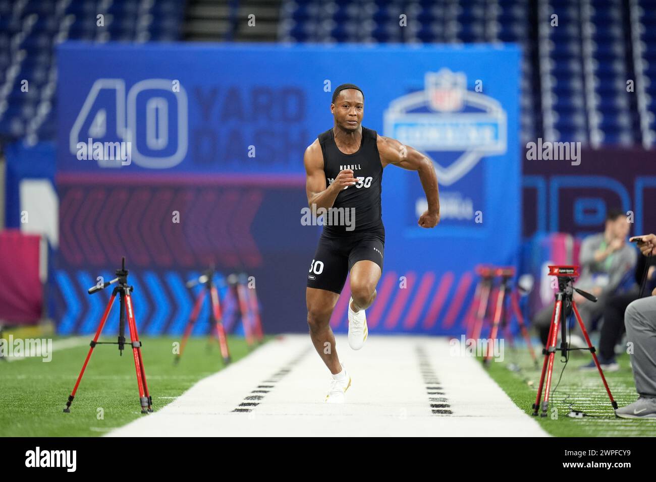 Washington running back Dillon Johnson runs a drill at the NFL football ...