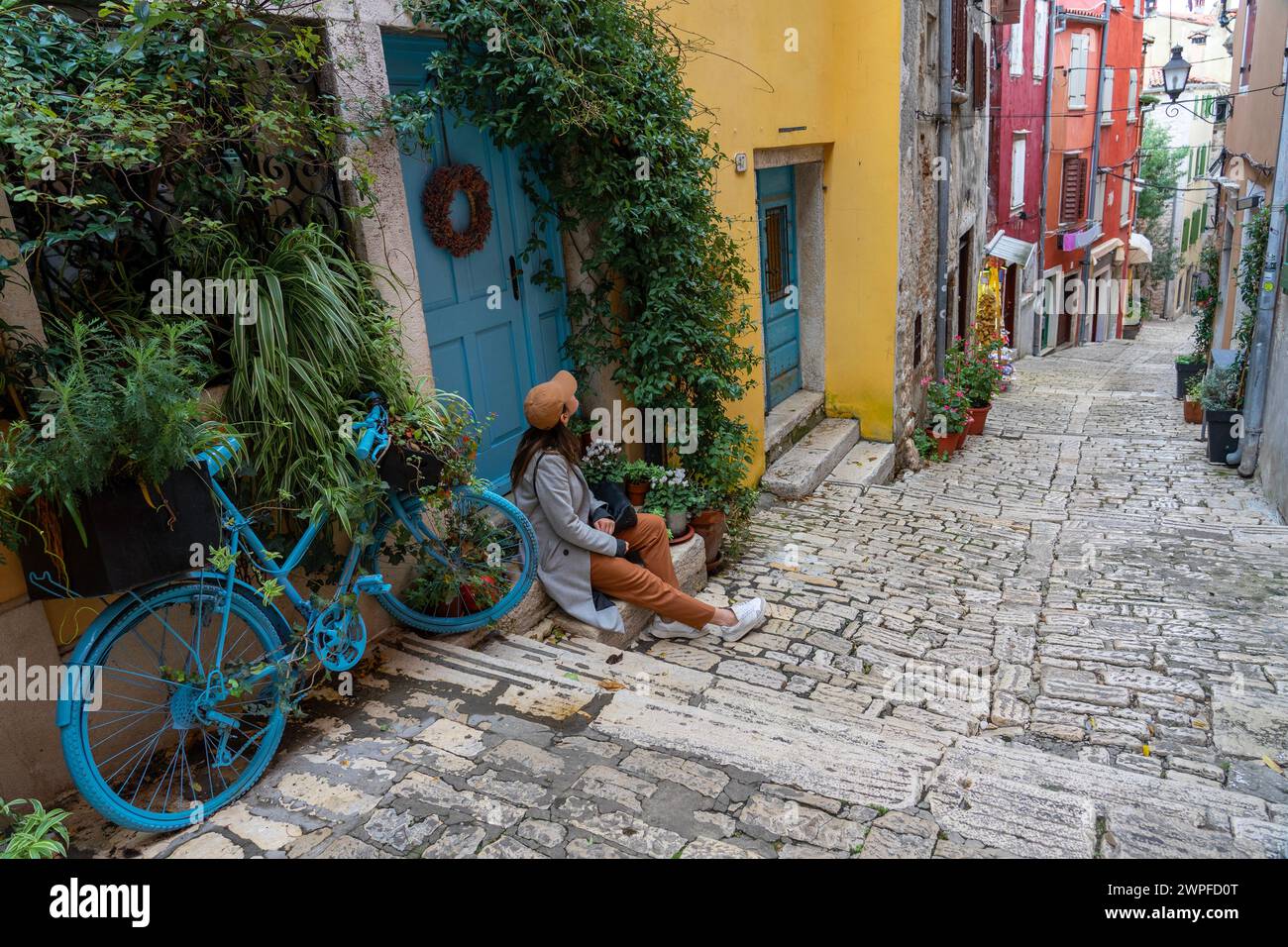 cityscape grisia street view in Rovinj Croatia with yellow houses and ...
