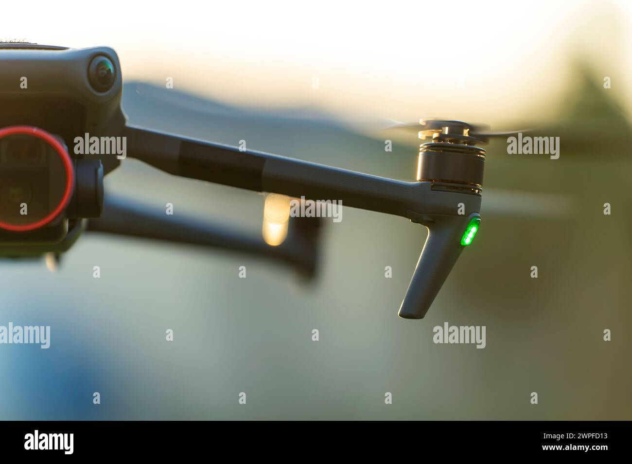 Drone quadcopter with digital camera and fast rotating propellers ...