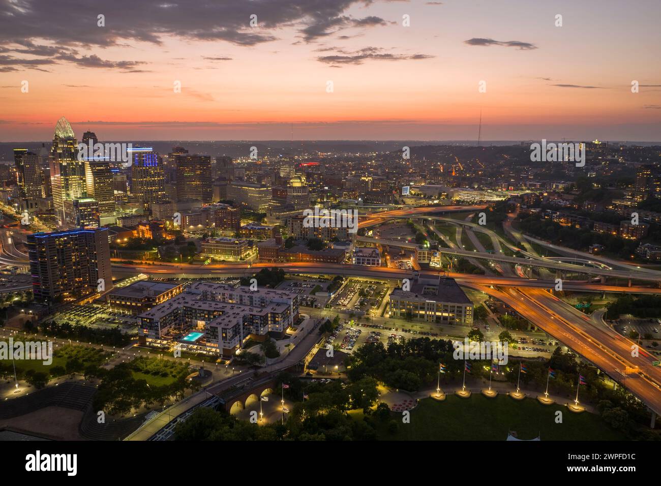 Downtown district of Cincinnati in Ohio, USA at night with brightly ...