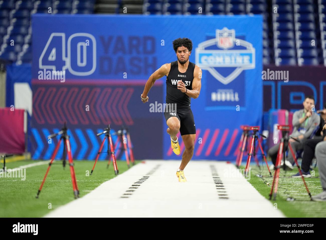 Washington running back Dillon Johnson runs a drill at the NFL football ...