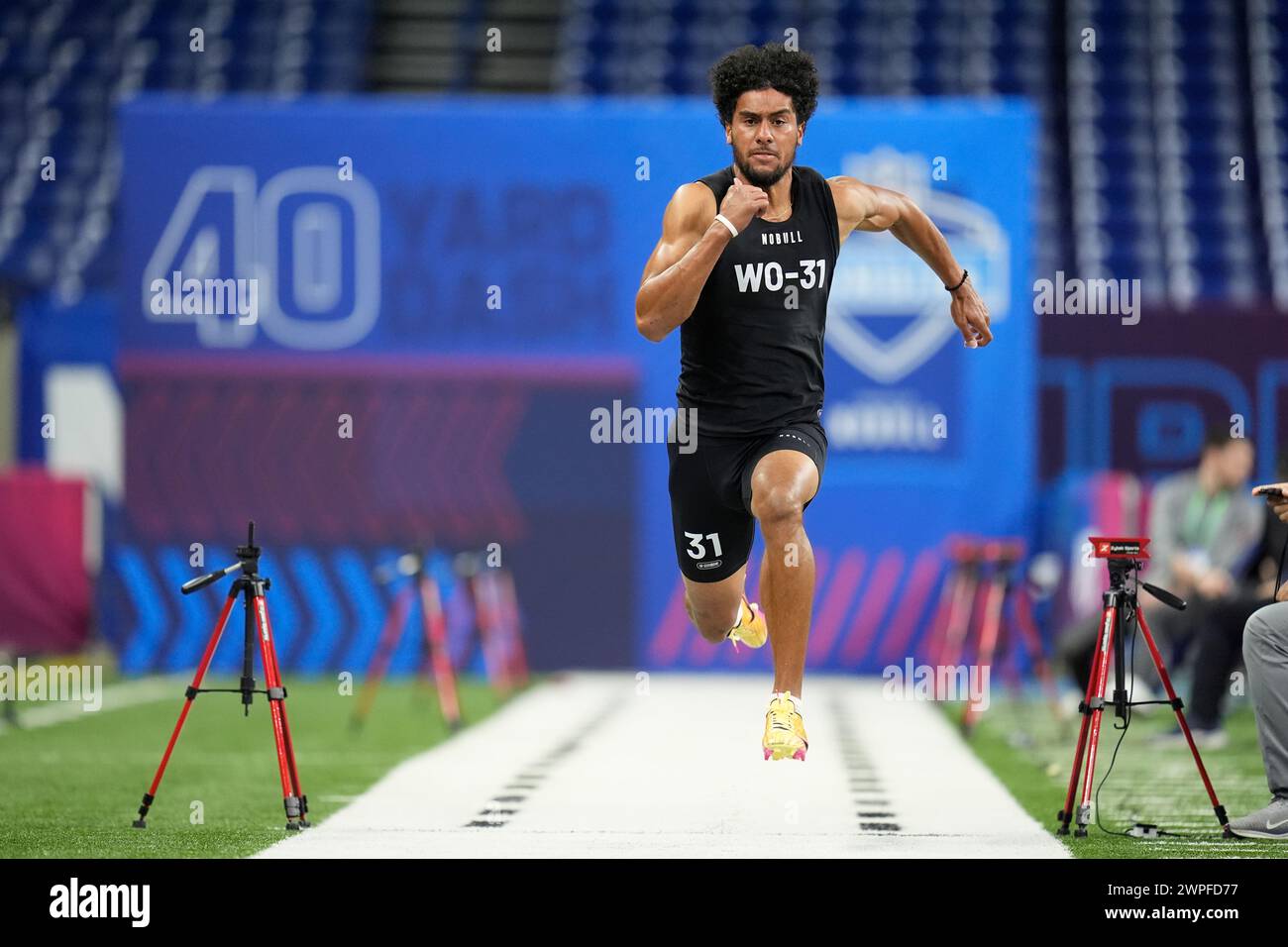 Washington running back Dillon Johnson runs a drill at the NFL football ...