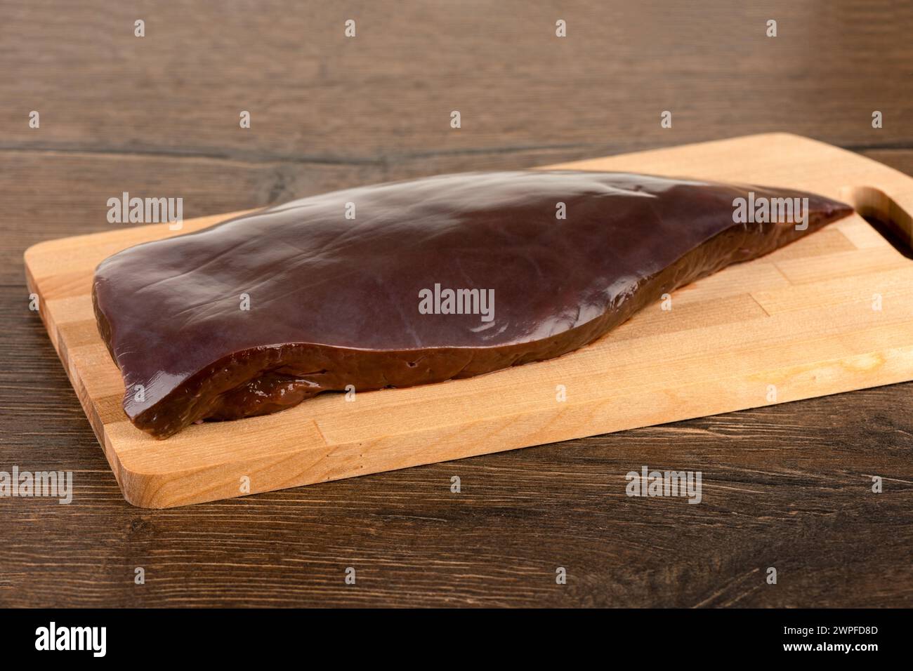 Raw beef liver hi-res stock photography and images - Alamy