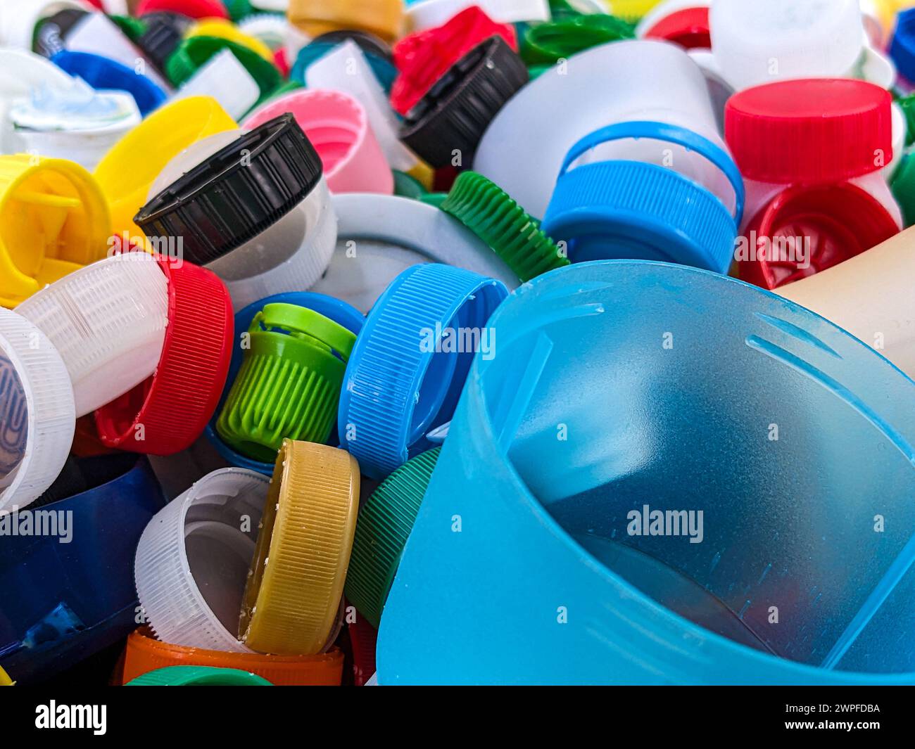 Lots of different plastic bottle caps. Garbage sorting Stock Photo - Alamy