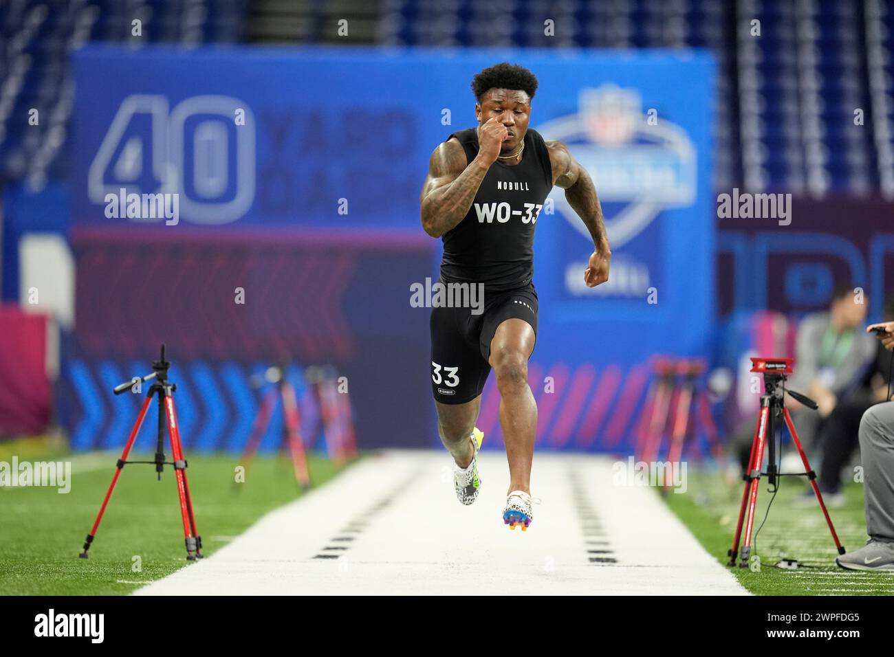 Washington running back Dillon Johnson runs a drill at the NFL football ...