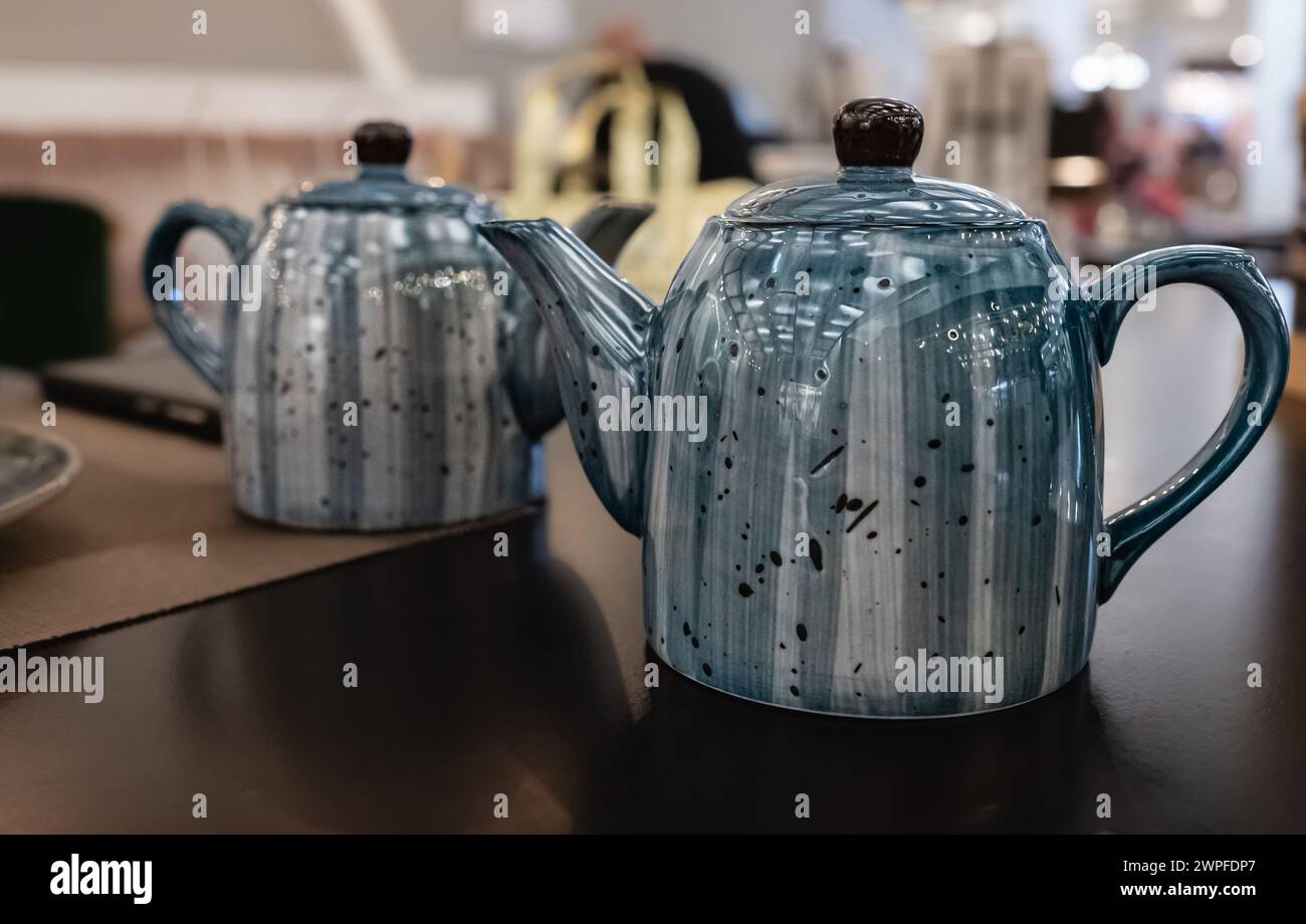 Teapot with a unique and beautiful design for interior decoration. Blue ...