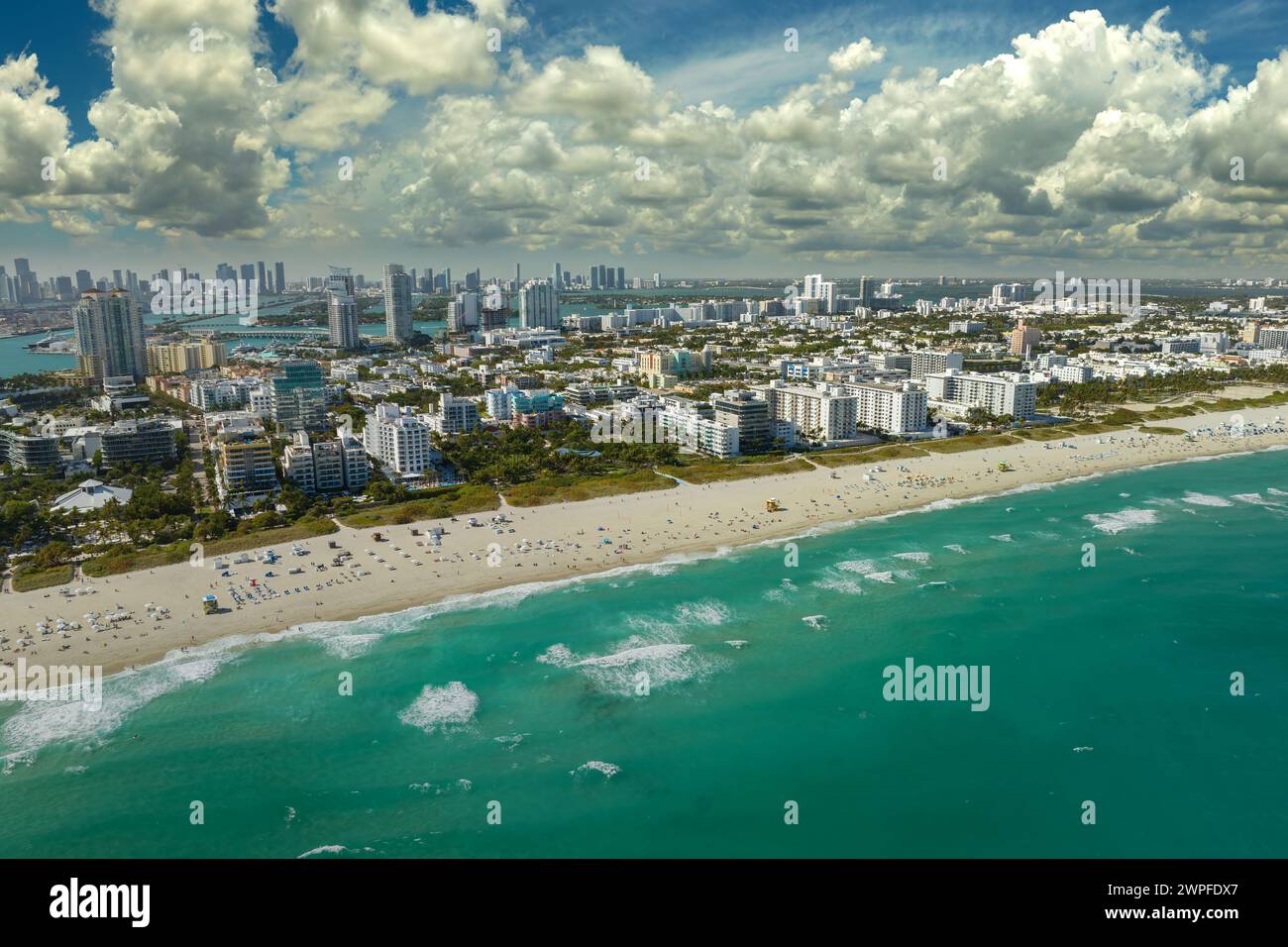 Miami Beach is popular vacation spot in southern Florida. Sandy beach ...