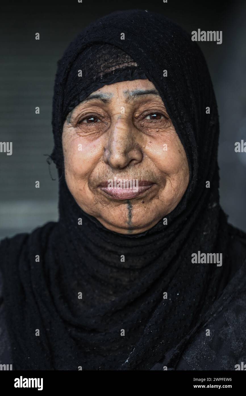 Baghdad, Iraq. 07th Mar, 2024. Umm Muhammad, 66 years old, poses for ...