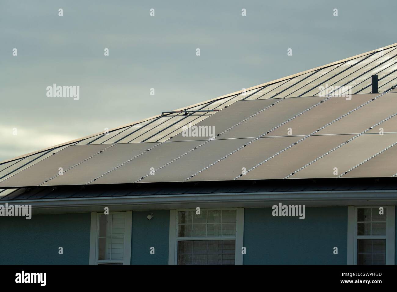 Standard american residential house with rooftop covered with solar ...