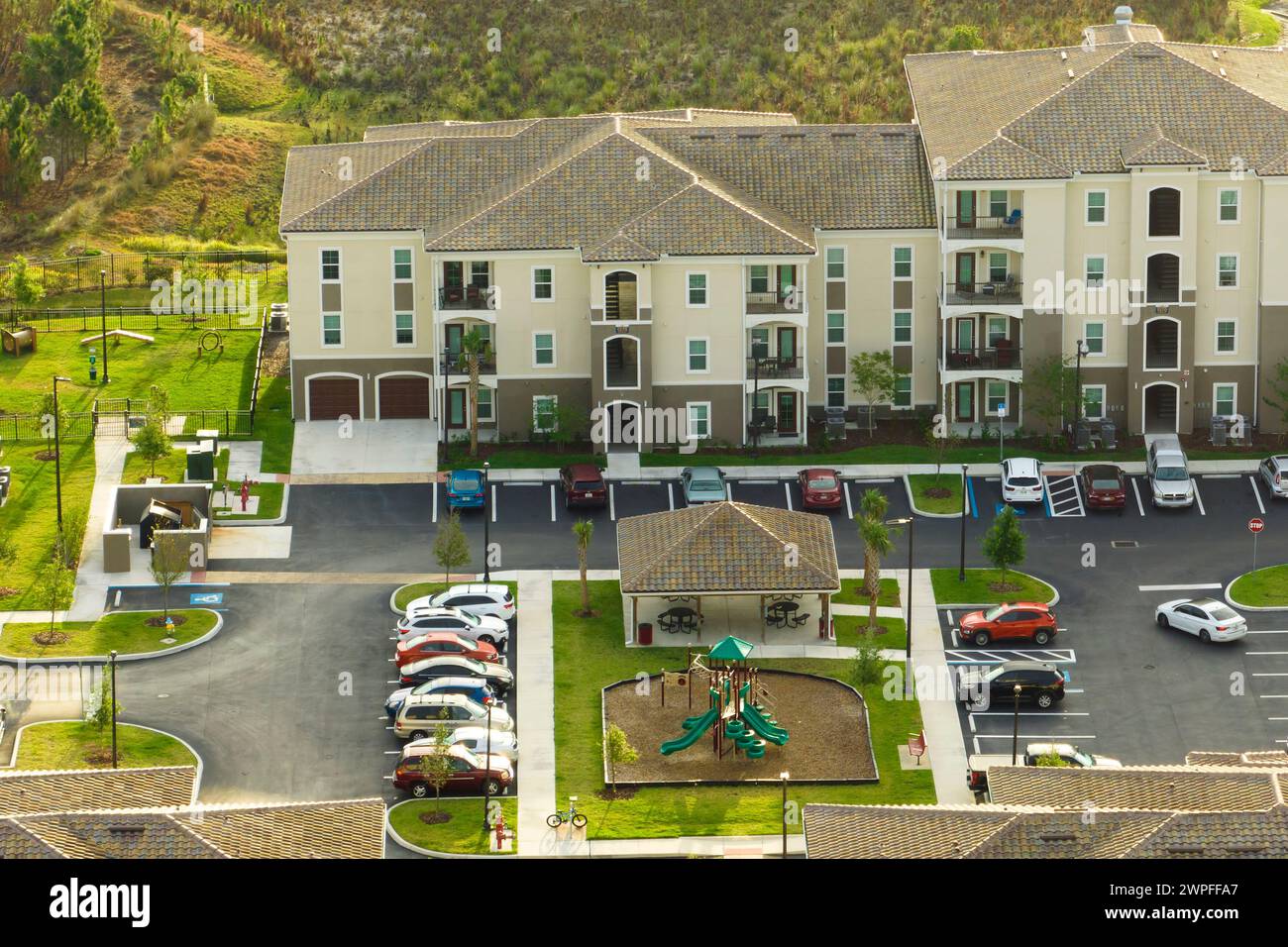 Top view of new apartment condos in Florida suburban area. Family ...