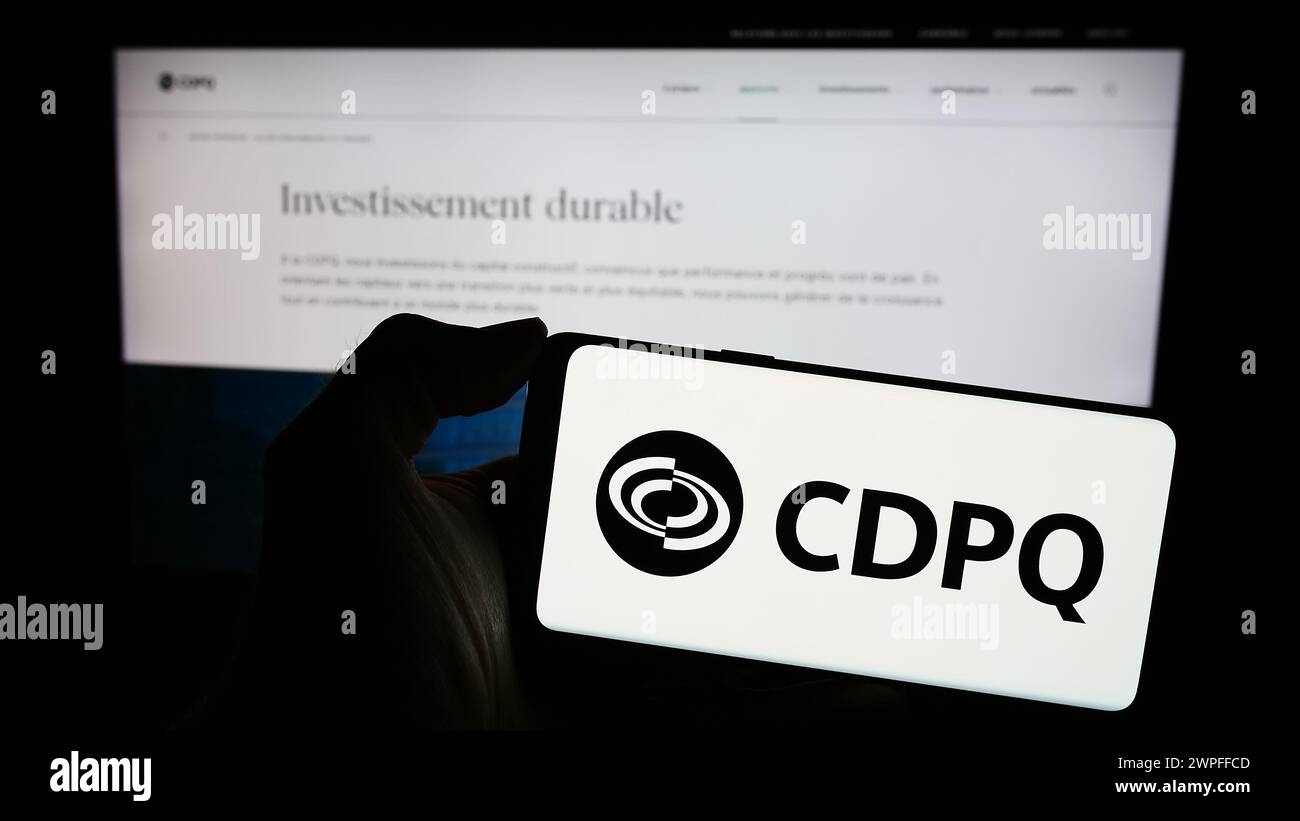 Person holding mobile phone with logo of Caisse de Depot et Placement ...