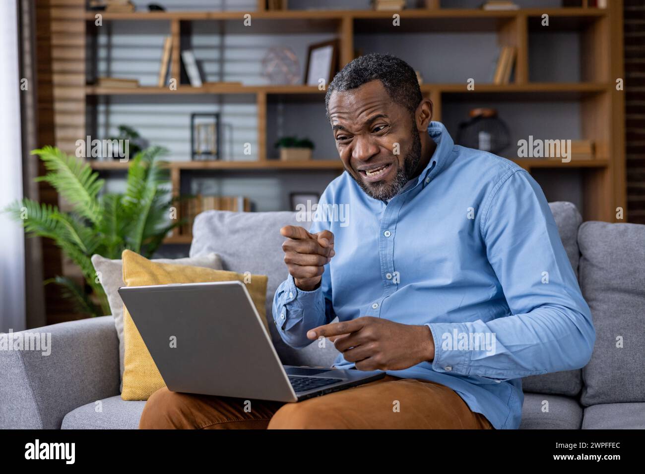 Frustrated middle aged man trying hi-res stock photography and images ...