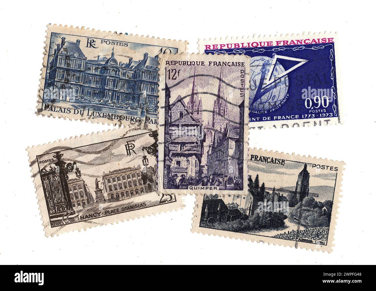 A montage of vintage postage stamps from France isolated on a white ...