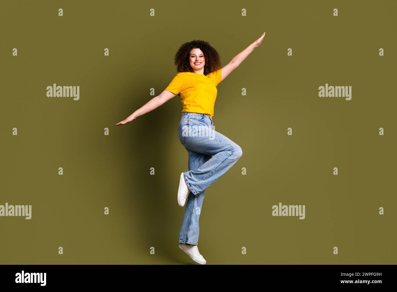 Full body photo of young woman chevelure hair jumping flying like wings ...